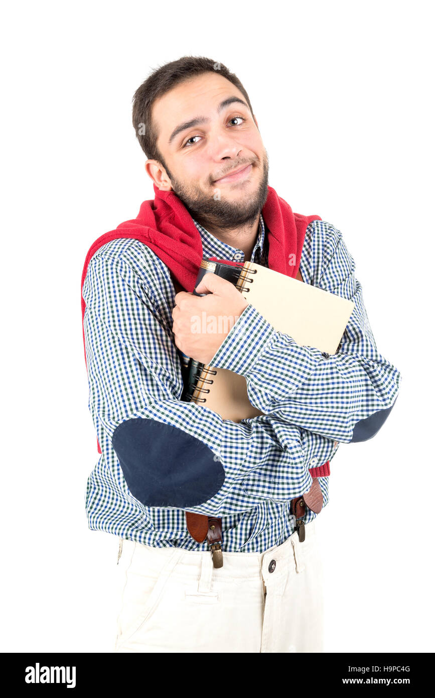 Young nerd student posing with books isolated in a white background ...