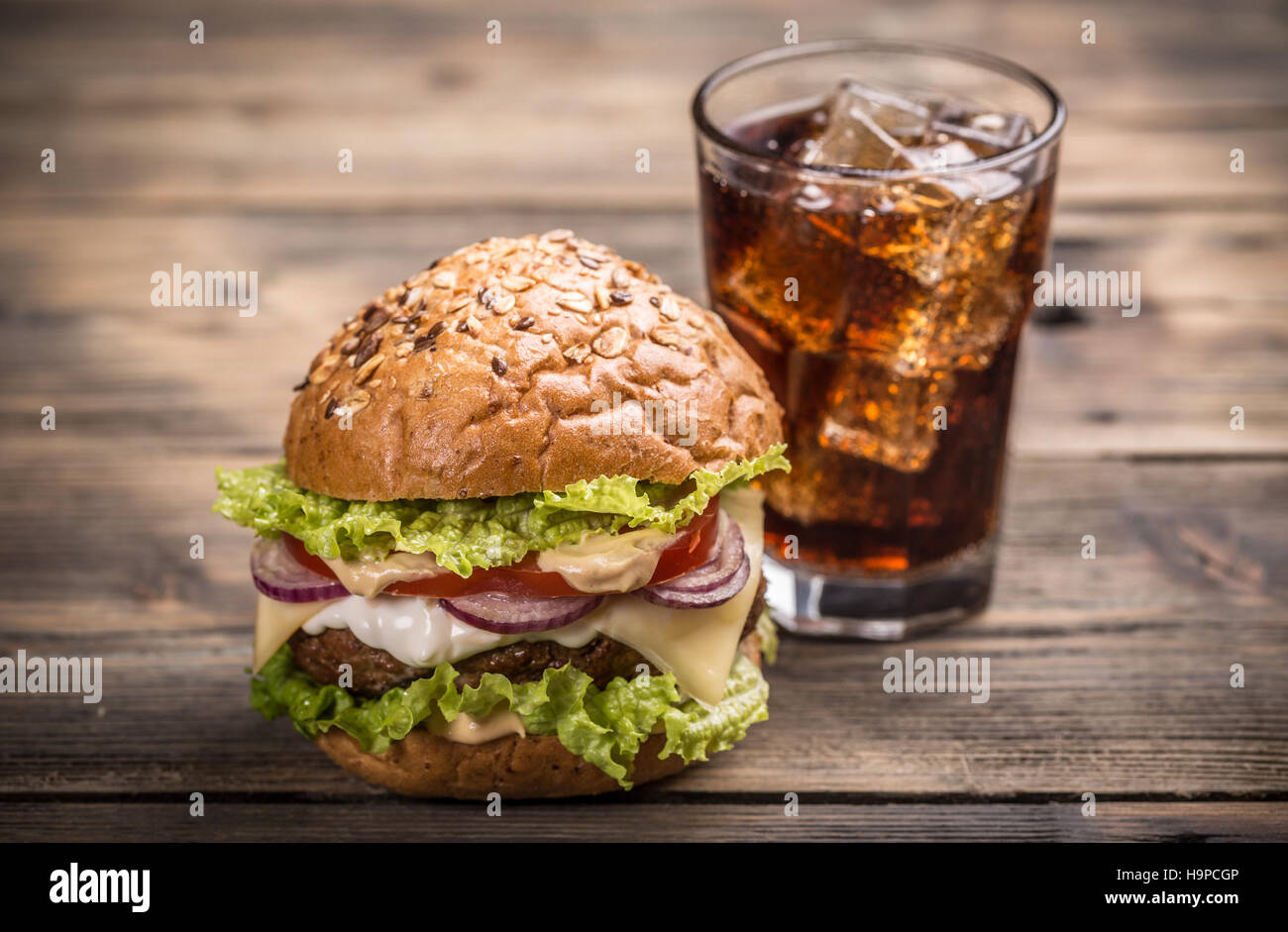 Burger and cola hi-res stock photography and images - Alamy