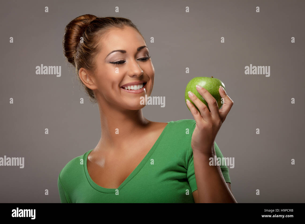 Girl With Apple Stock Photo - Alamy