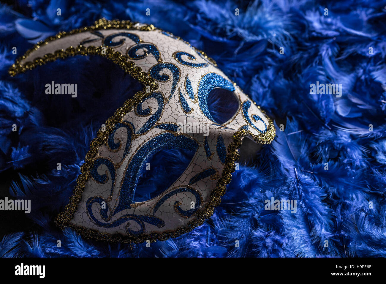 Carnival blue mask with feather hi-res stock photography and images - Alamy