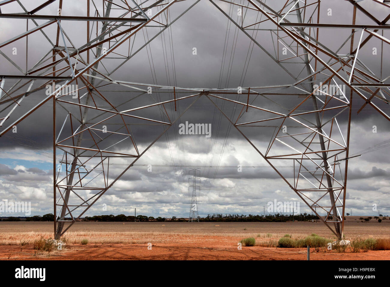 Looking across landscape to high tension pylons, Western Australia ...
