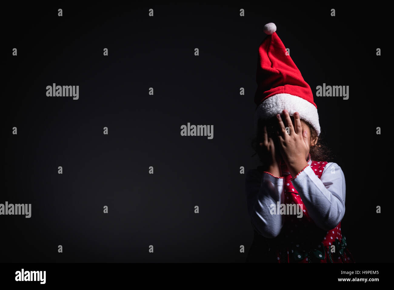 Santa claus portrait hiding face hi-res stock photography and images ...