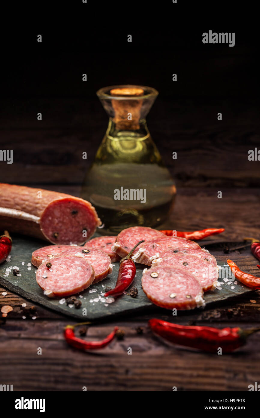 Smoked salami slice Stock Photo - Alamy