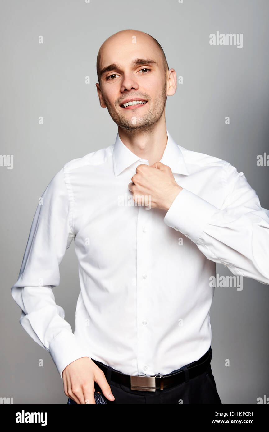 Unbutton hi-res stock photography and images - Alamy