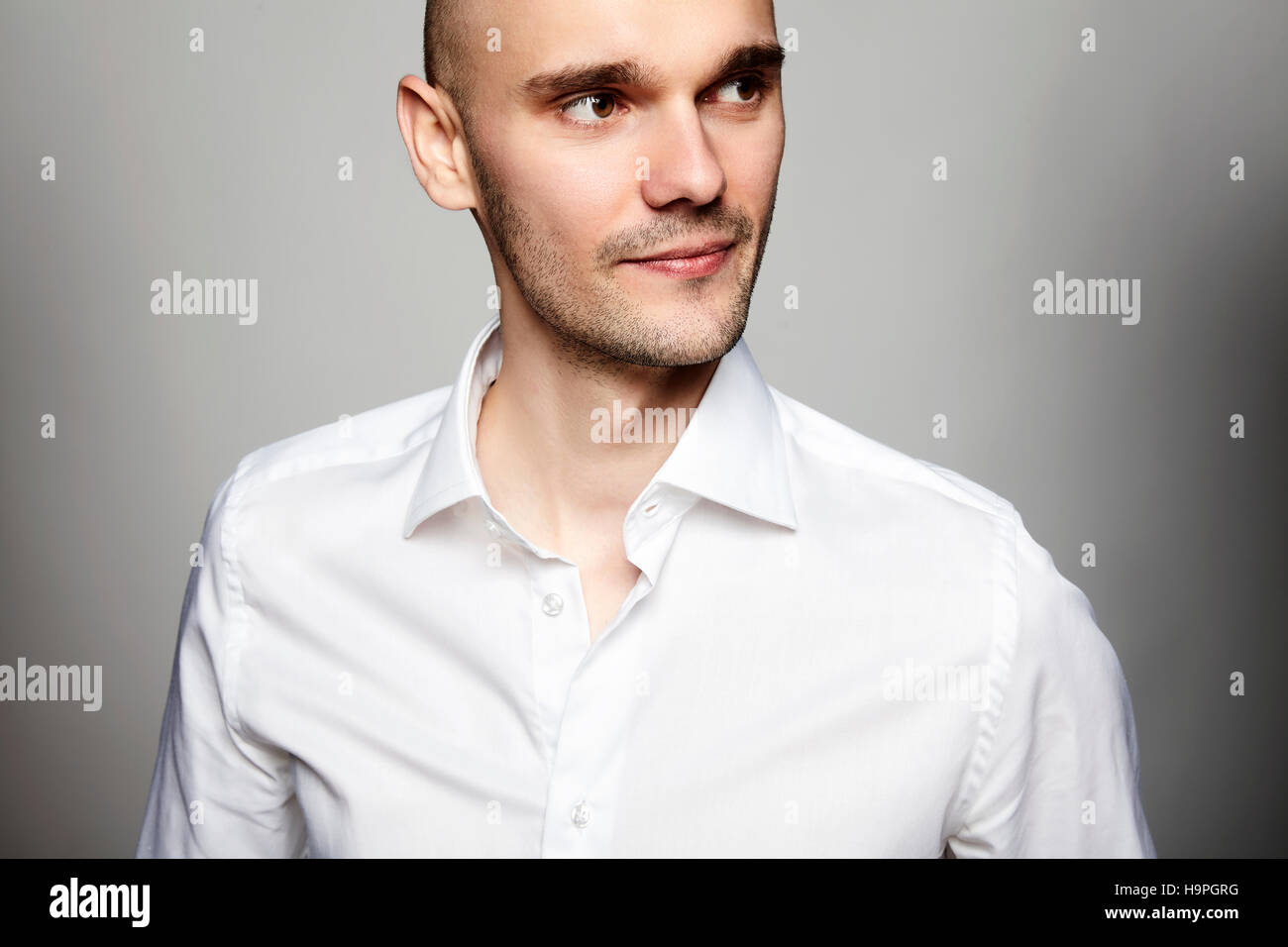 Focused business man in white hi-res stock photography and images - Alamy