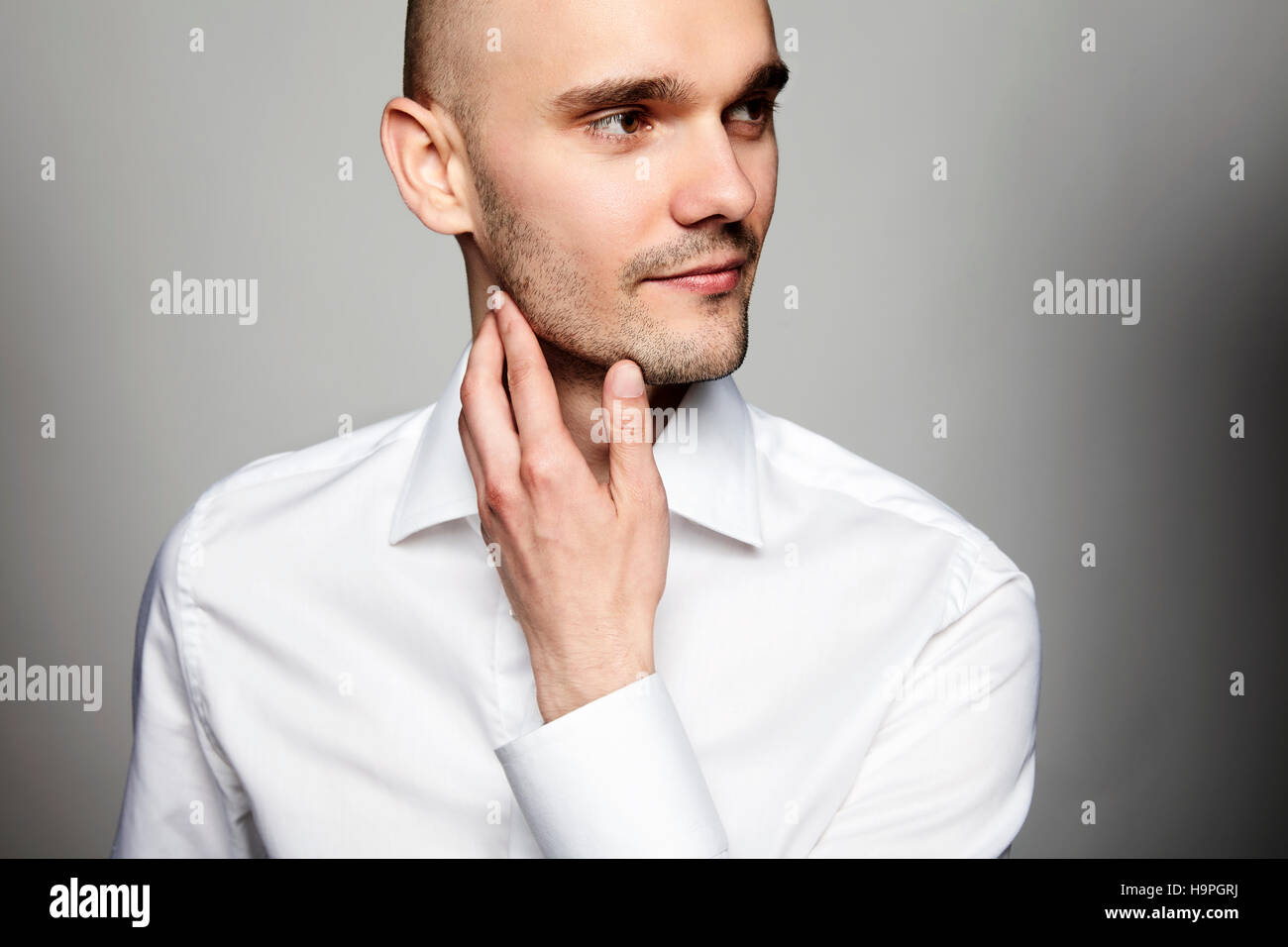 Pensive face young man close hi-res stock photography and images - Alamy