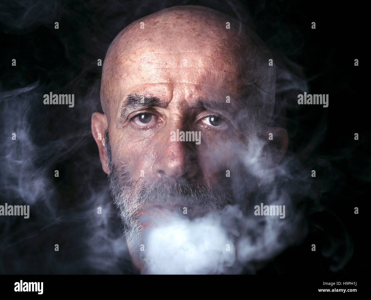 Blowing smoke in face hi-res stock photography and images - Alamy