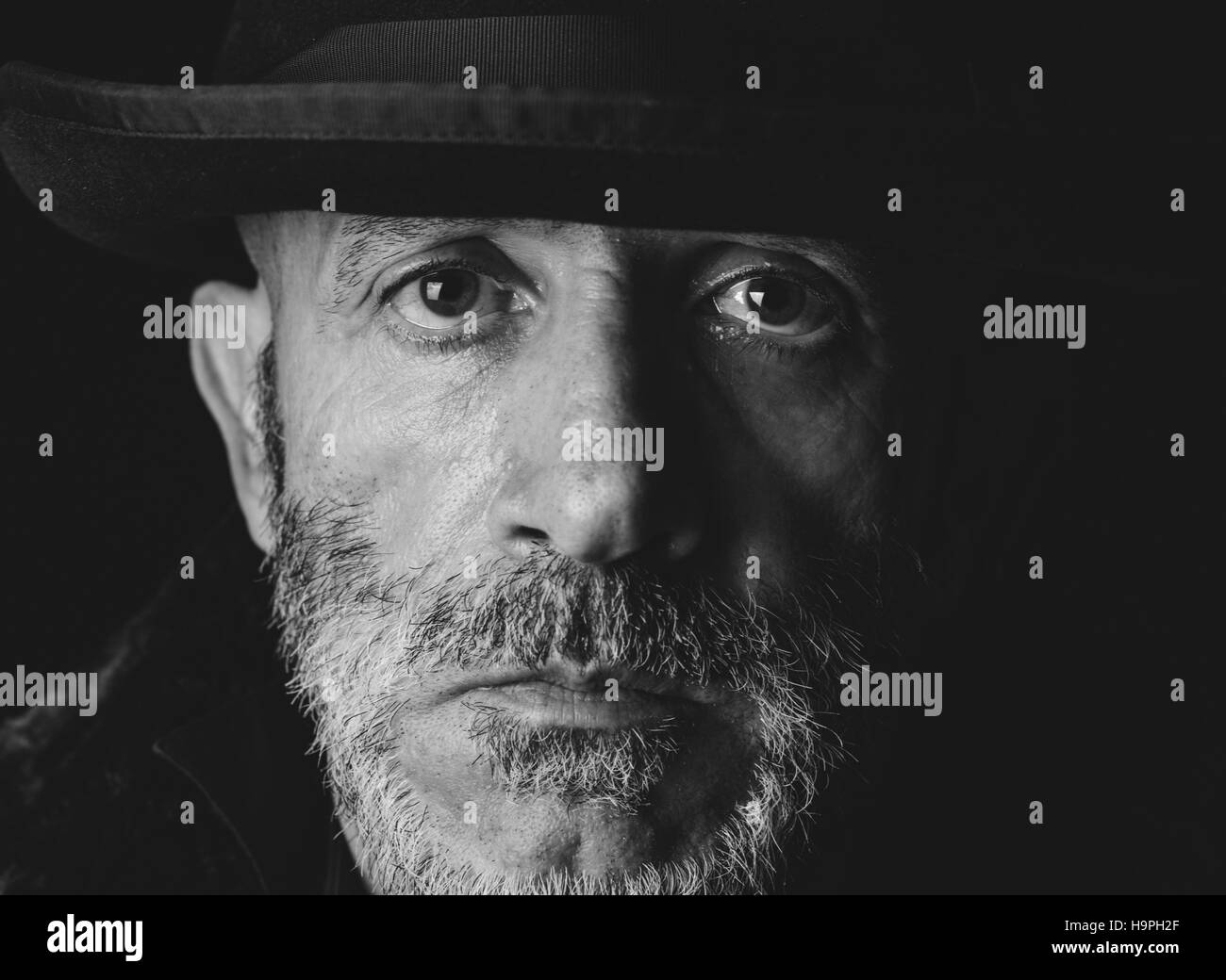 Portrait of senior man in monochrome and low key Stock Photo - Alamy