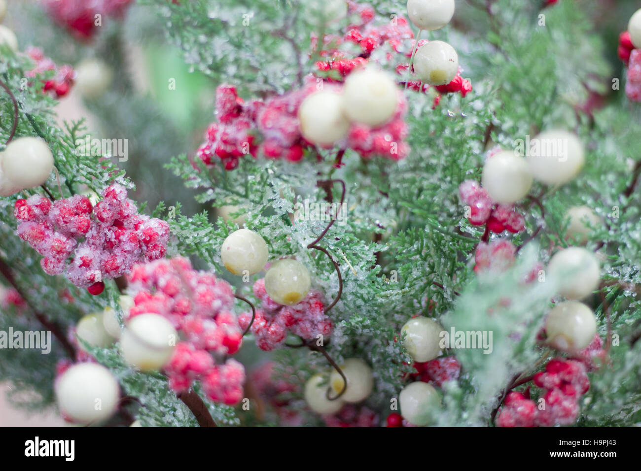 Christmas and New Year winter seasonal snow tree with pink and white ...