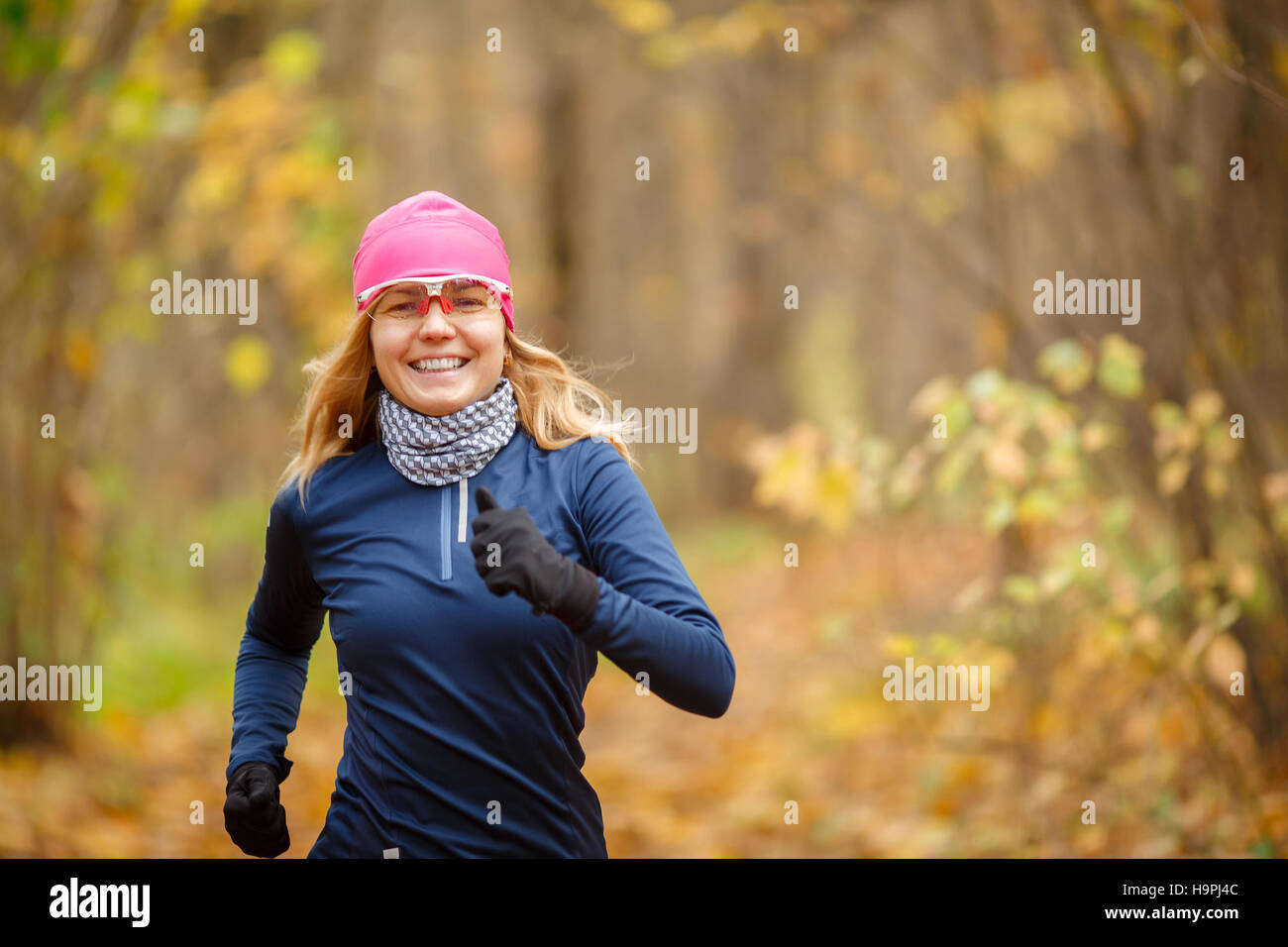 Portrait of beautiful female athletes on jogging Stock Photo - Alamy