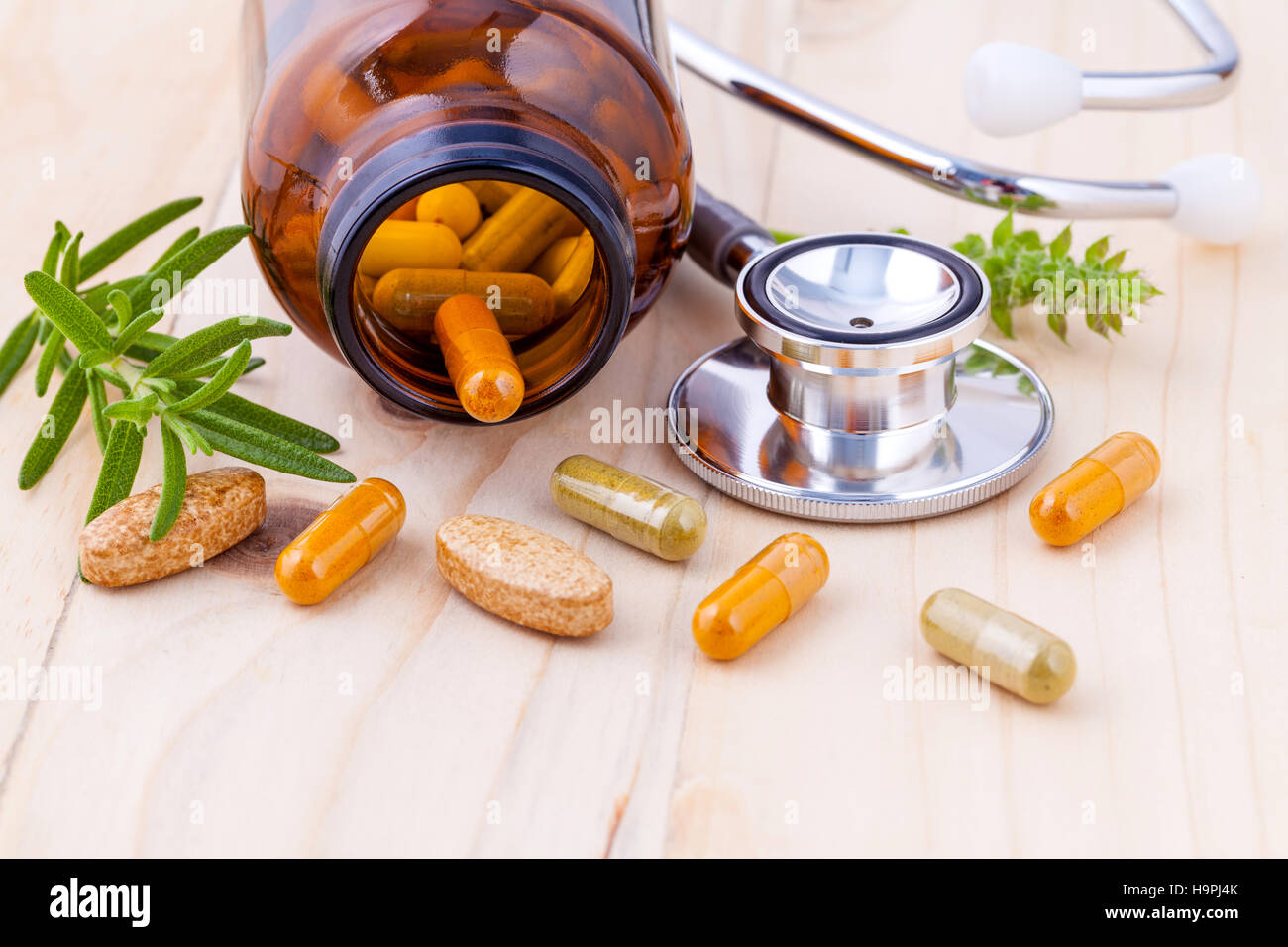 capsule of herbal medicine alternative healthy care with stethos Stock ...