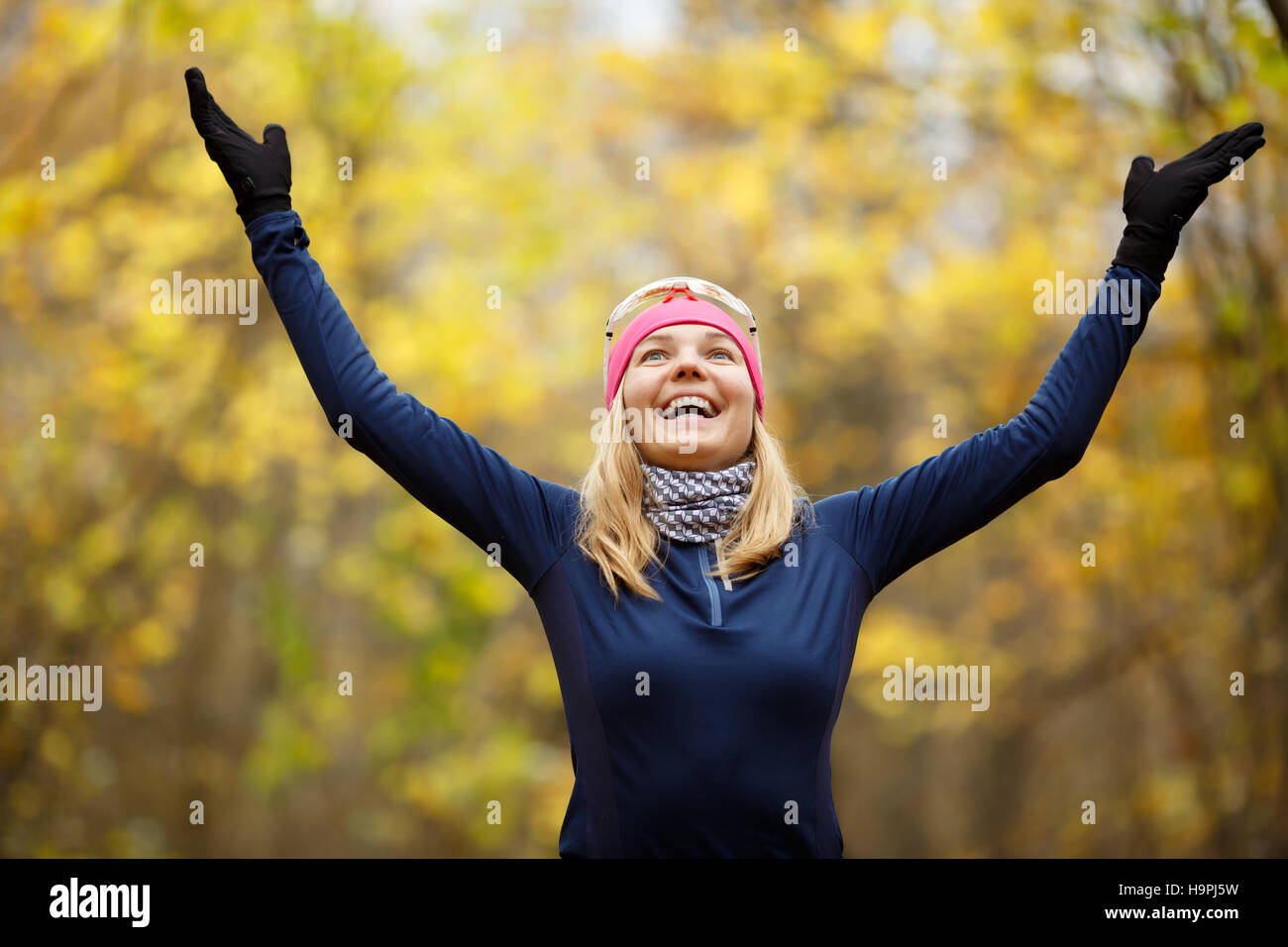 Smiling girl background of landscape Stock Photo - Alamy