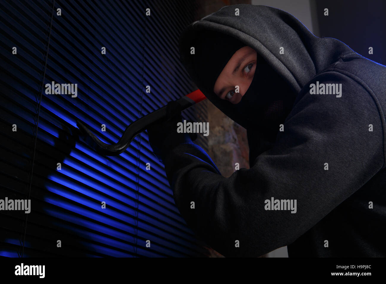 Thief night with master key Stock Photo - Alamy