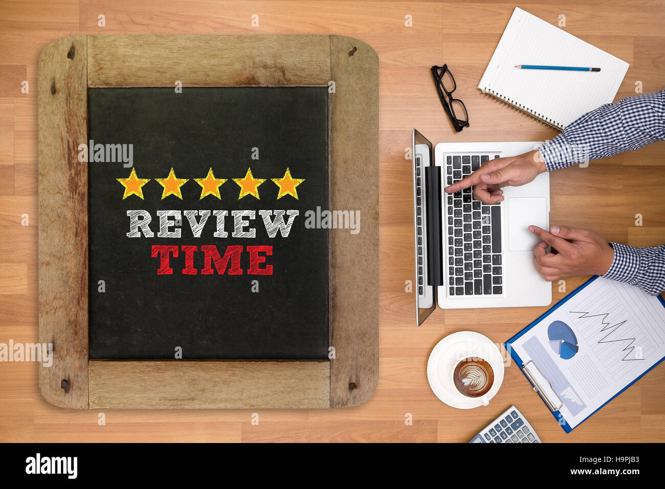 Review Time words, Businessman working Stock Photo - Alamy