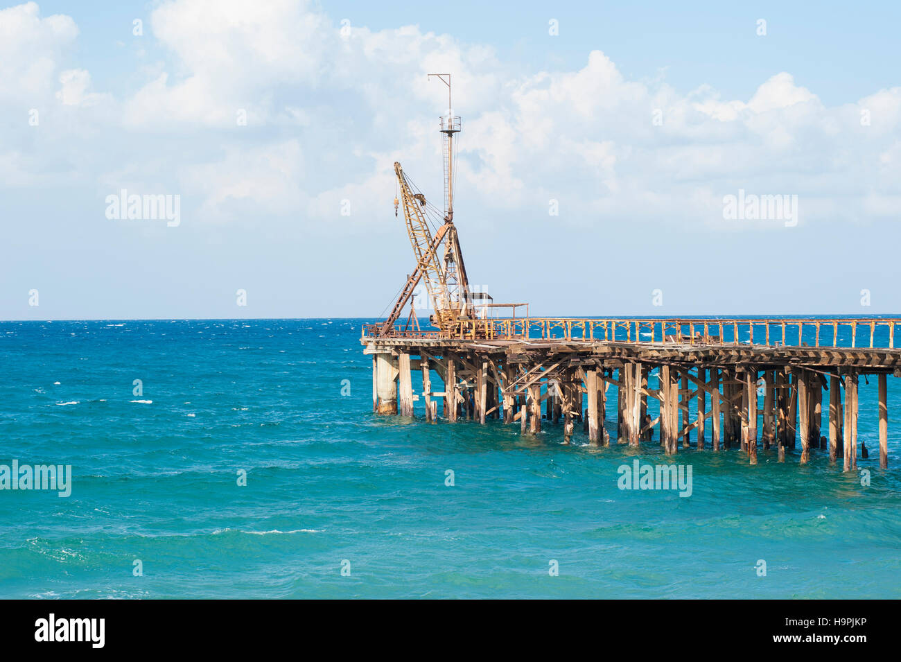 A defunct pier on the shore of Northern Cyprus in Lefka (Turkish: Lefke ...