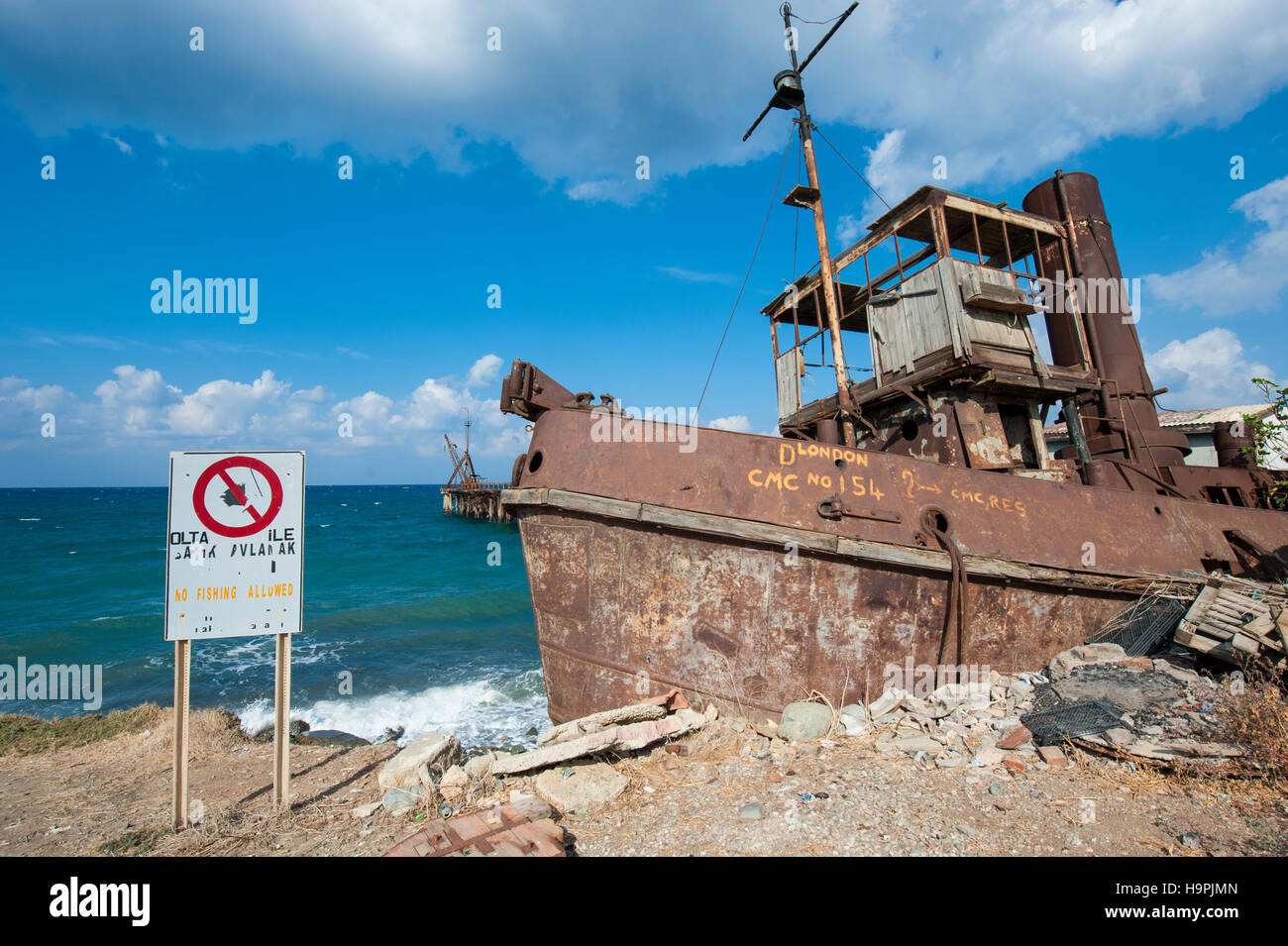 A defunct pier on the shore of Northern Cyprus in Lefka (Turkish: Lefke ...