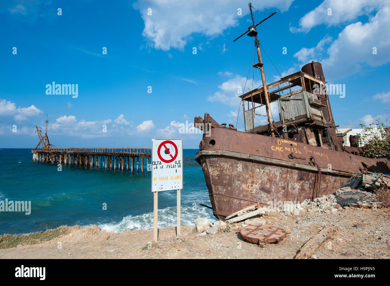 A defunct pier on the shore of Northern Cyprus in Lefka (Turkish: Lefke ...