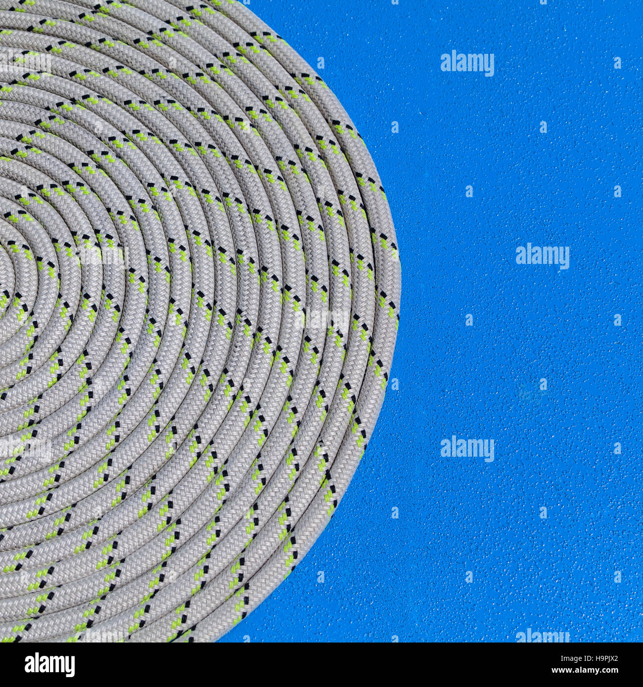 The rope wrapped in a spiral on sailboat yacht detail Stock Photo - Alamy