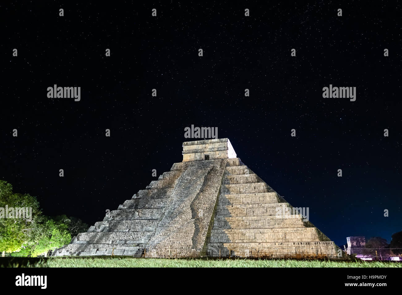 Mayan temple ruins in Chichen Itza by night with stars Pyramid of ...
