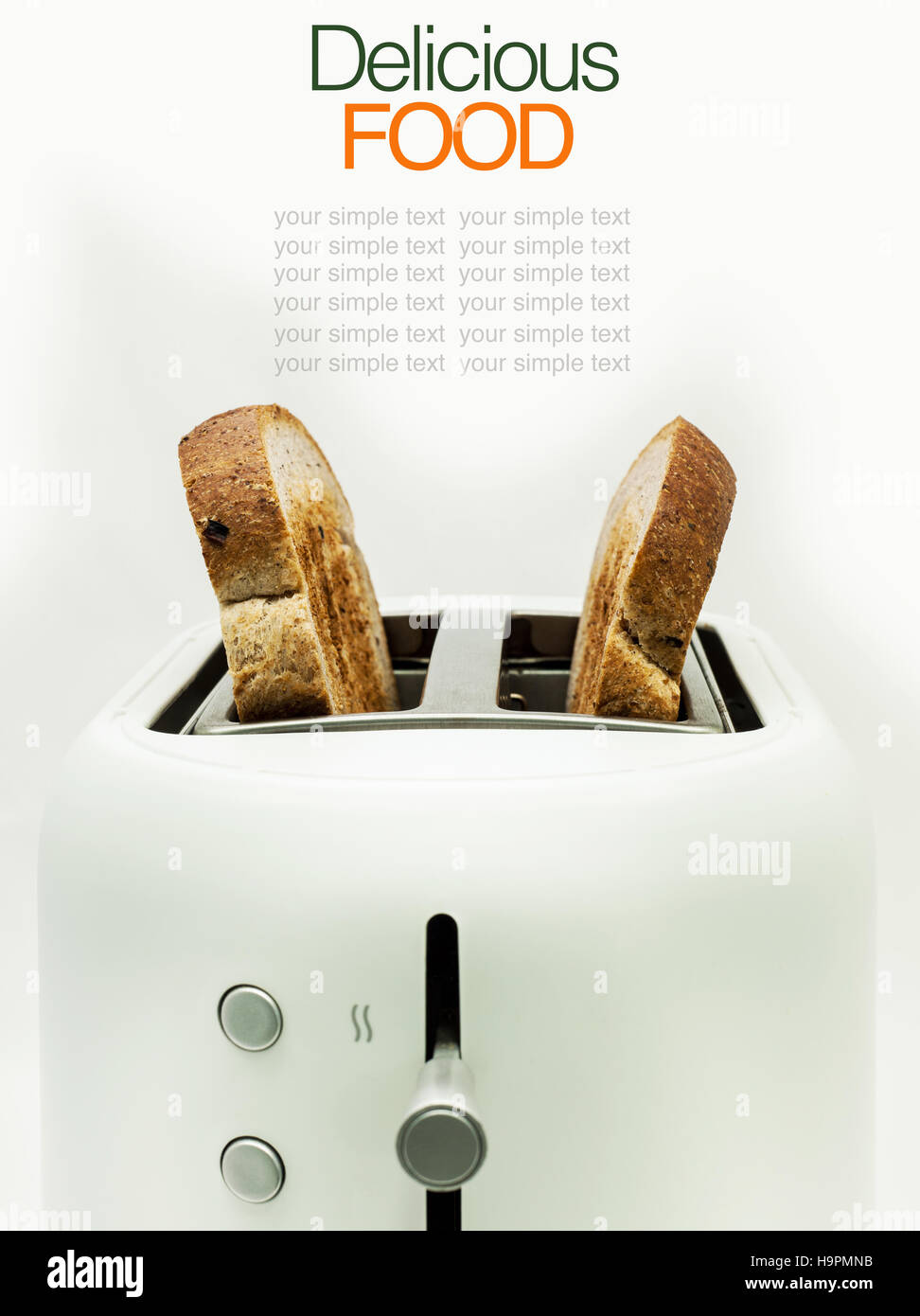 Toasted bread and toaster for breakfast Stock Photo - Alamy