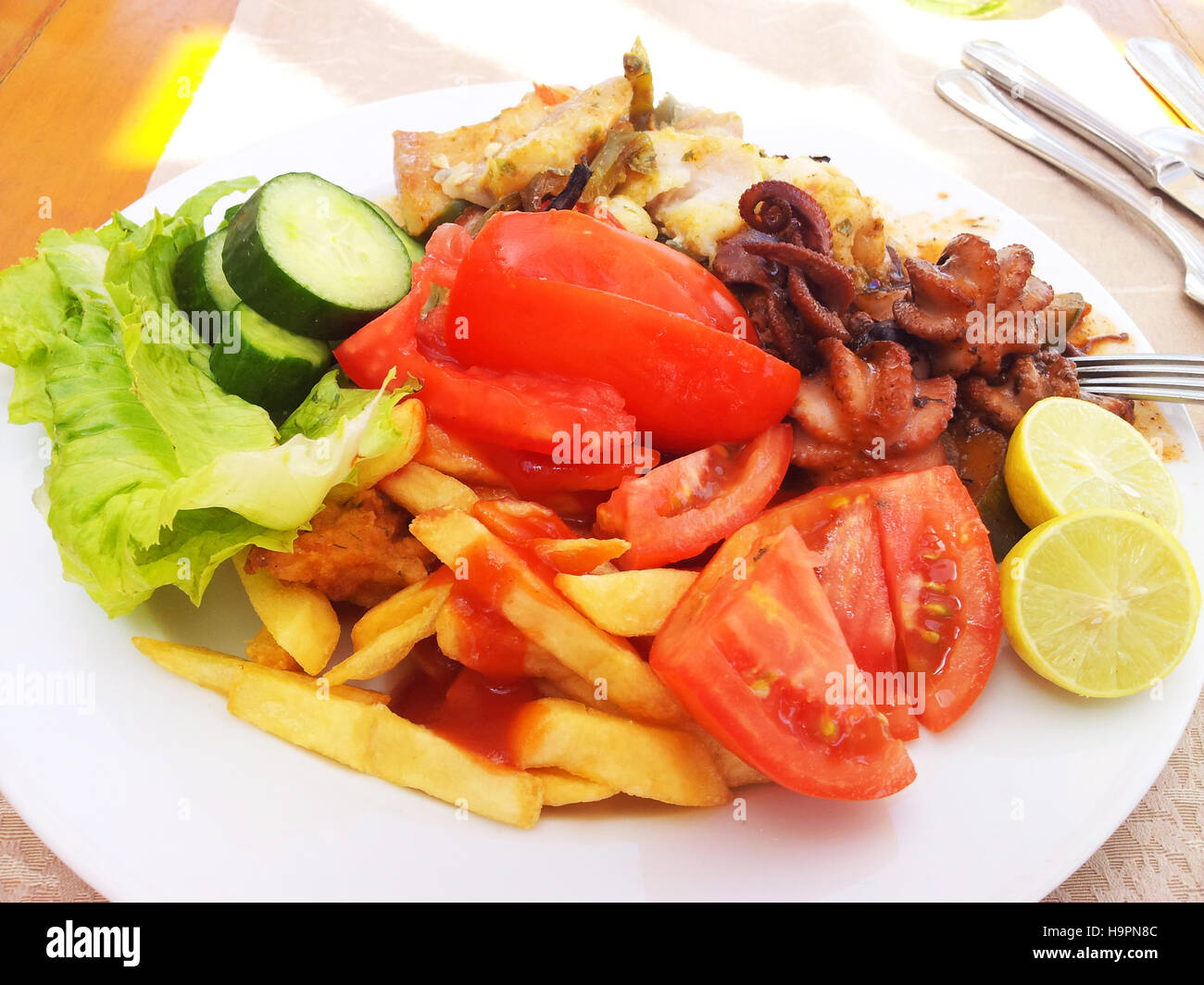 Bright picture of food on a white plate Stock Photo - Alamy