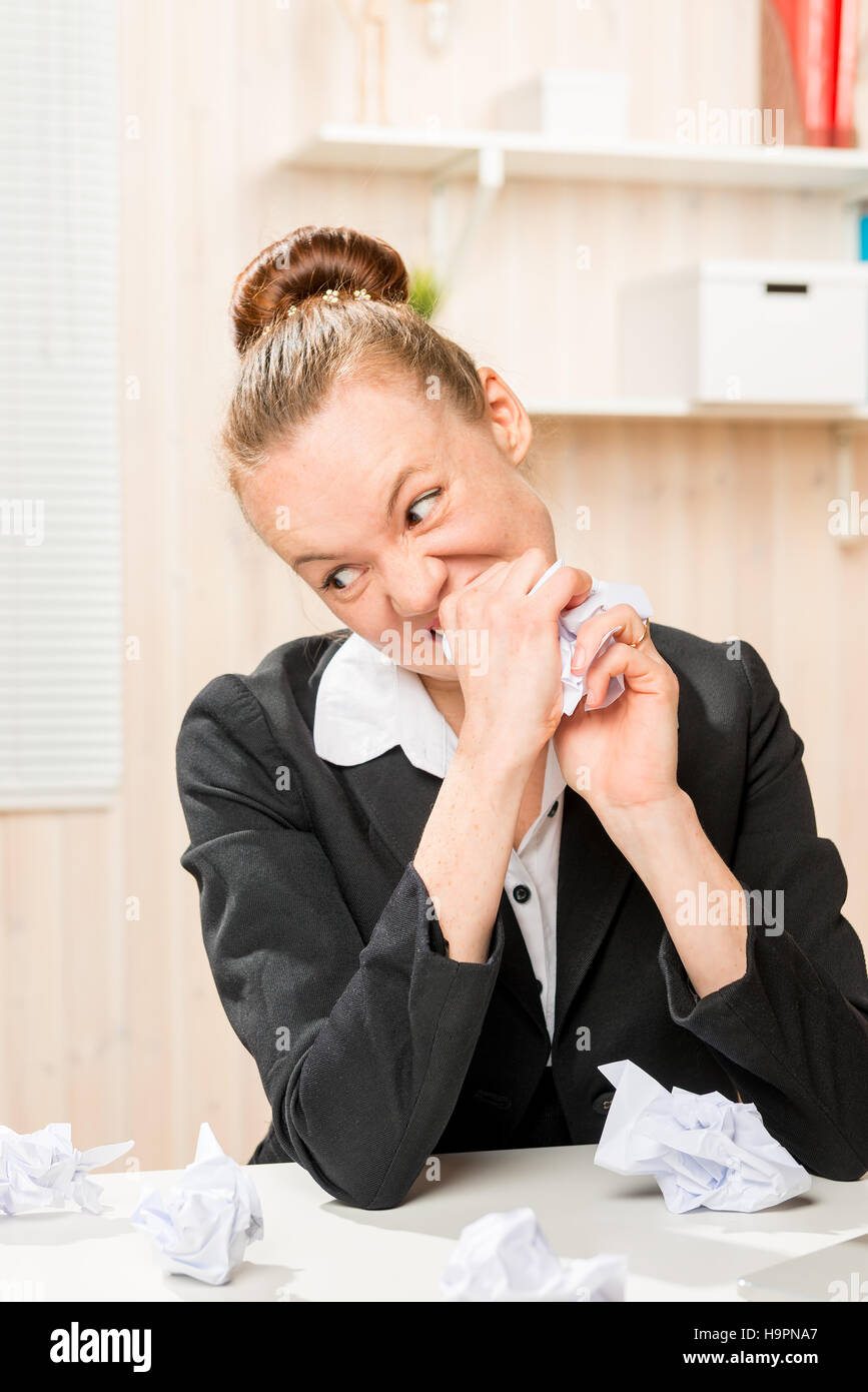 Emotional business woman in the office undergone stress Stock Photo - Alamy