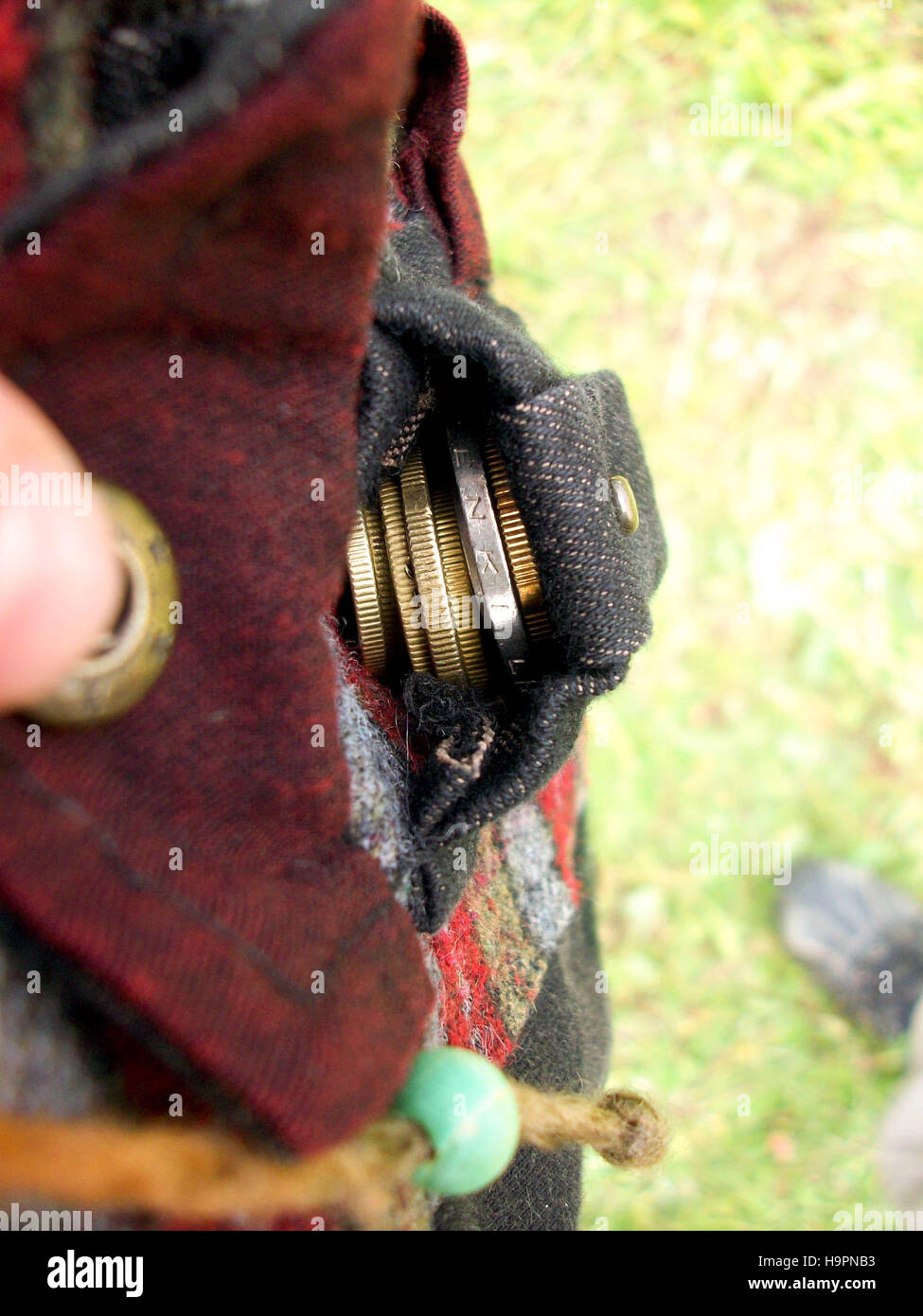 Coins in the pocket Stock Photo - Alamy