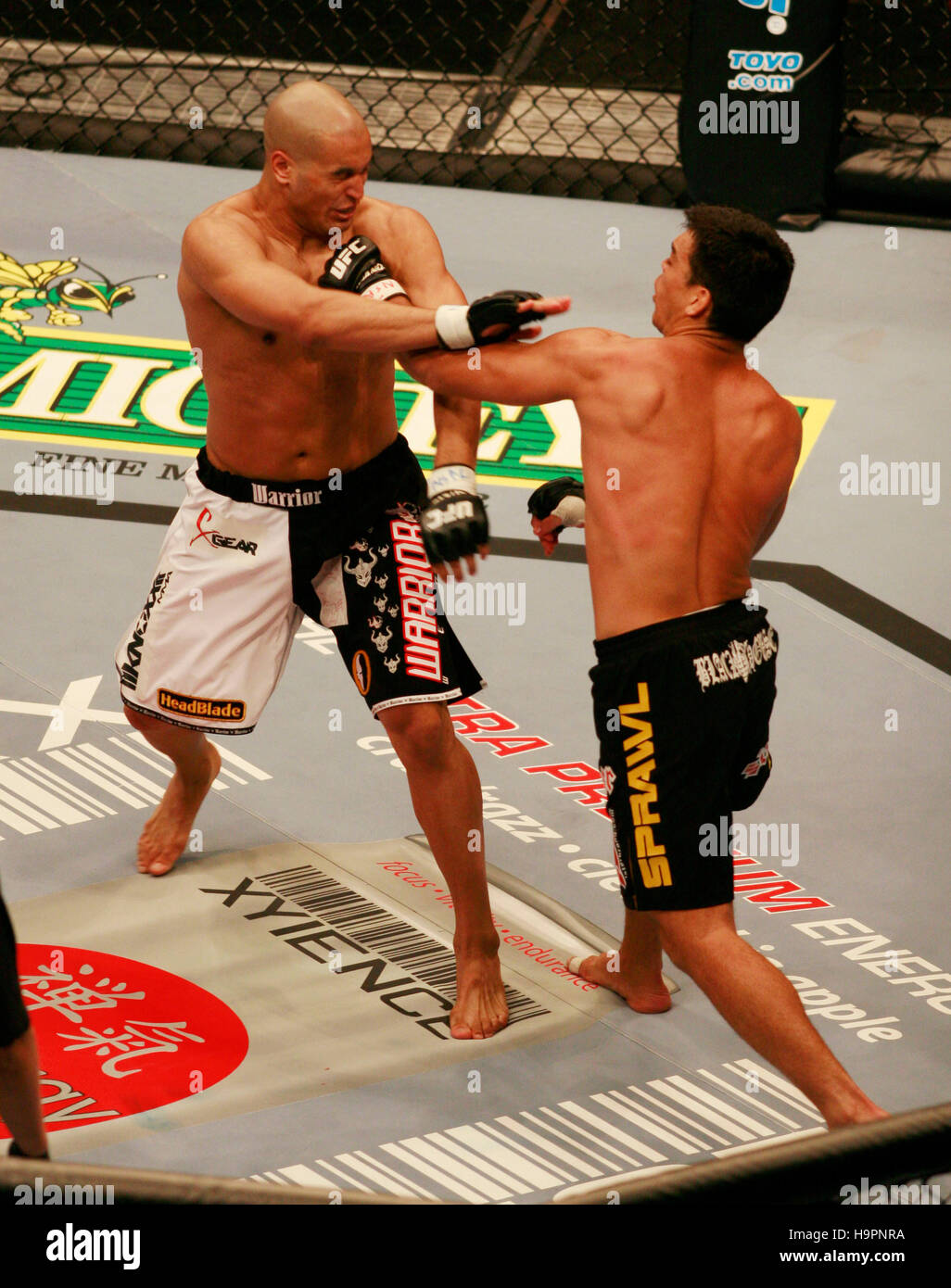 Lyoto Machida, right, fights Sam Hoger at the Ultimate Fighting ...