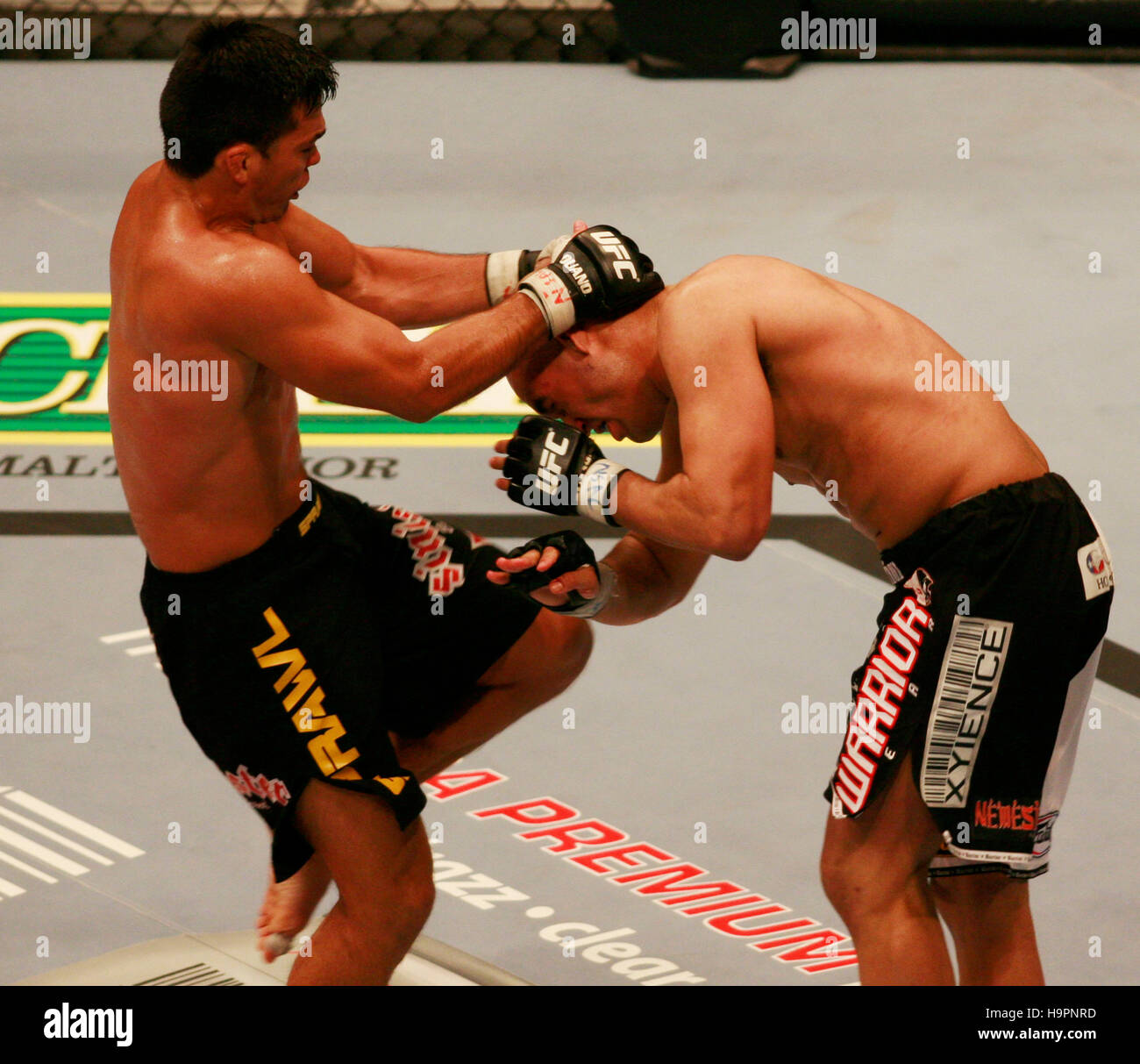 Lyoto Machida,left, fights Sam Hoger at the Ultimate Fighting Champion ...
