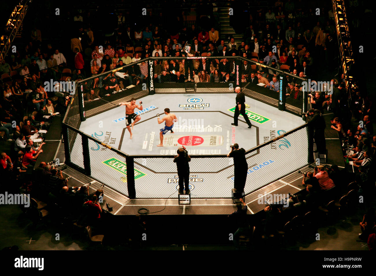 Patrick Cote, right, fights Scott Smith at the Ultimate Fighting ...