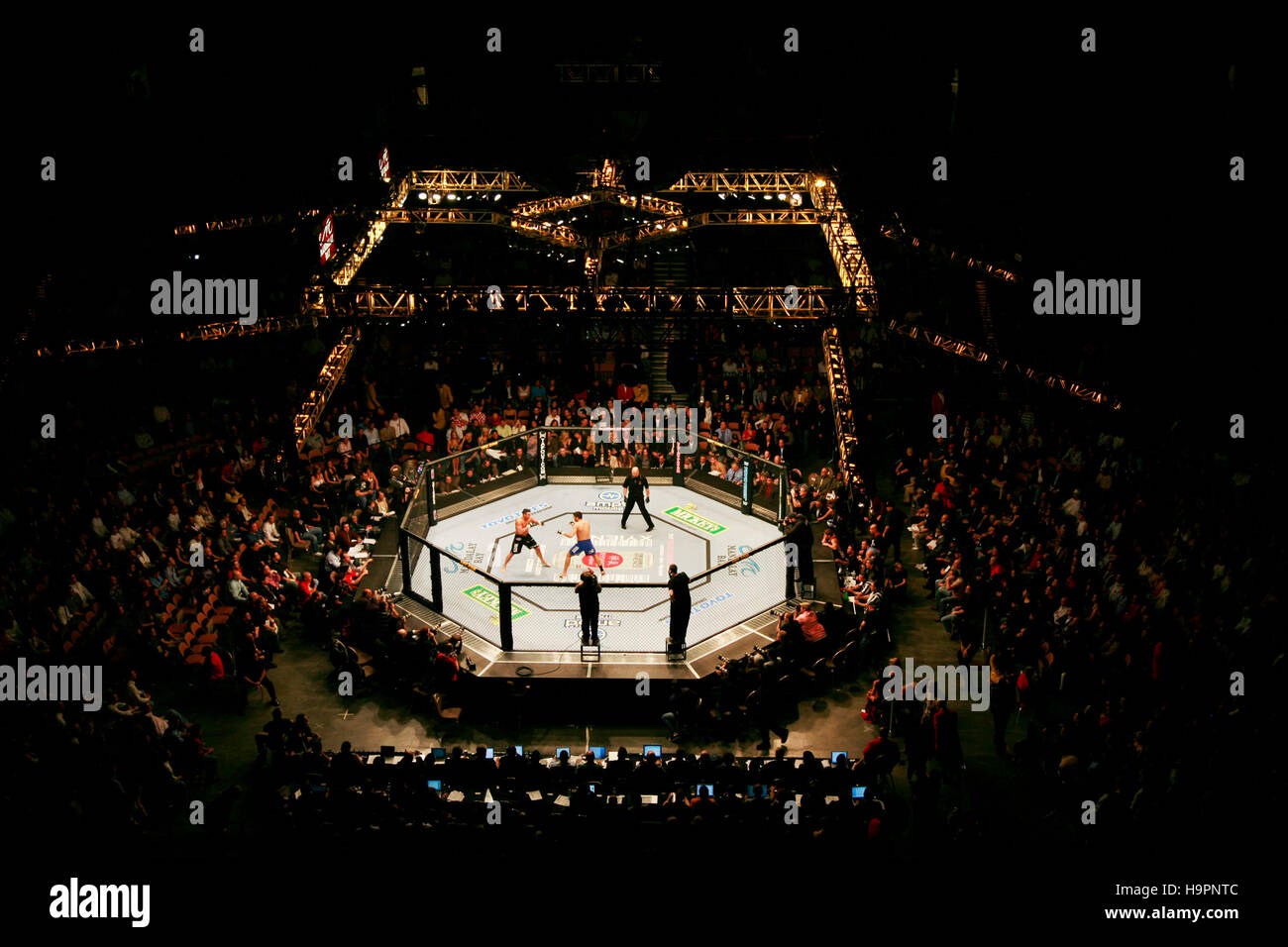 Patrick Cote, right, fights Scott Smith at the Ultimate Fighting ...