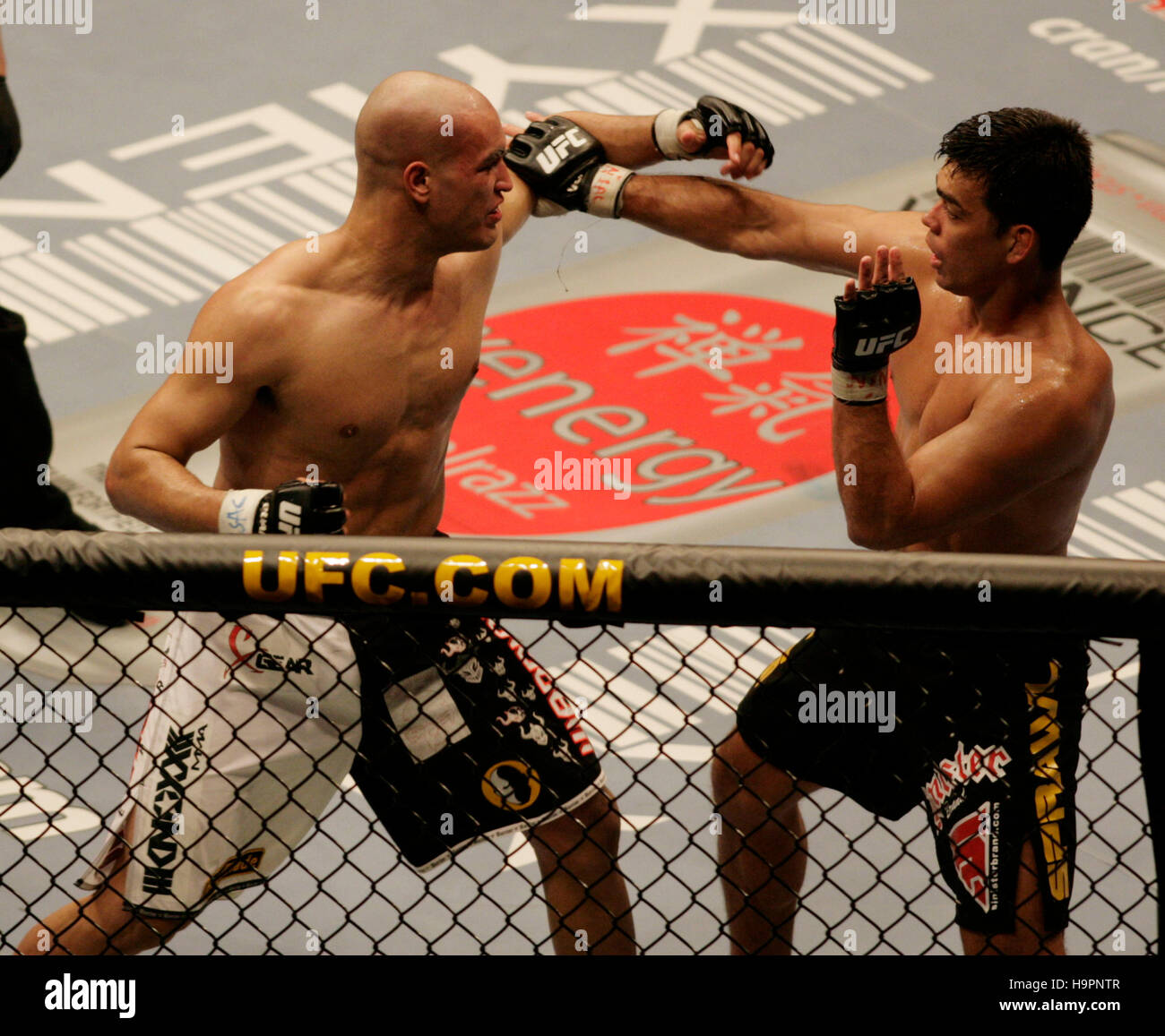 Lyoto Machida, right, fights Sam Hoger at the Ultimate Fighting ...