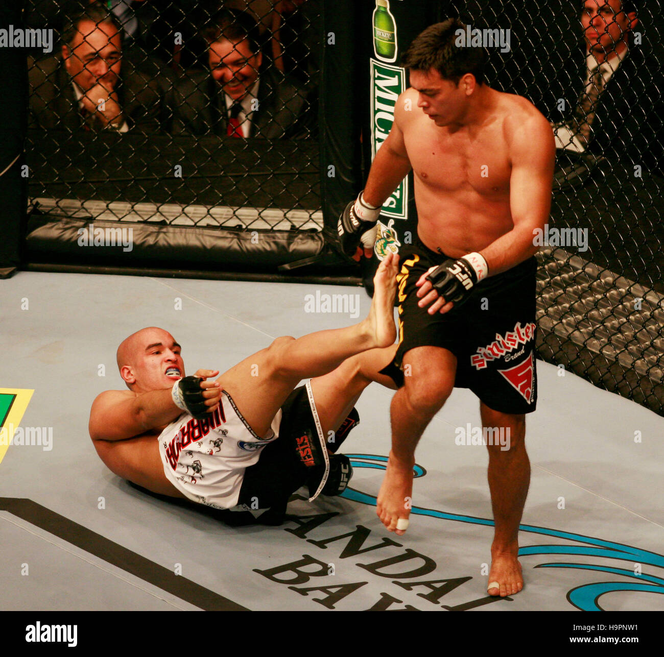 Lyoto Machida, right, fights Sam Hoger at the Ultimate Fighting ...