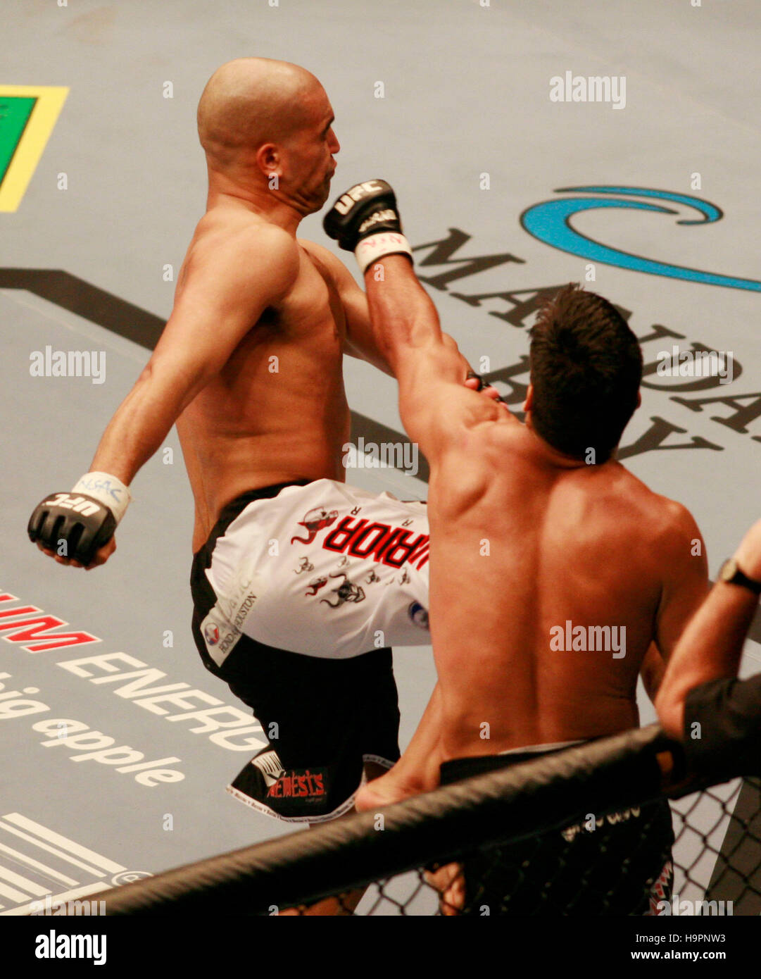 Lyoto Machida, right, fights Sam Hoger at the Ultimate Fighting ...