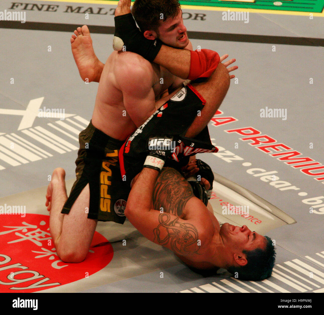 Dustin Hazelett, left, fights Diego Saraieva at the Ultimate Fighting ...