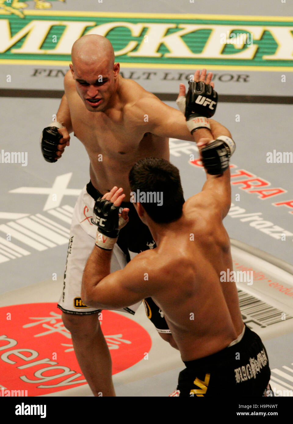 Lyoto Machida, right, fights Sam Hoger at the Ultimate Fighting ...