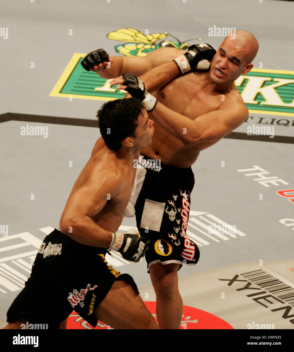 Sam Hoger, right, fights Lyoto Machida at the Ultimate Fighting ...