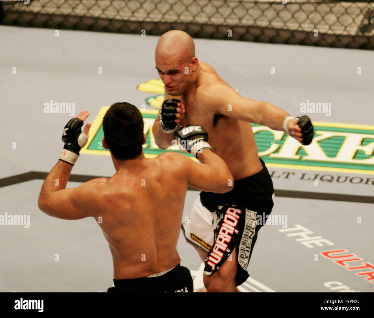 Sam Hoger, right, fights Lyoto Machida at the Ultimate Fighting ...