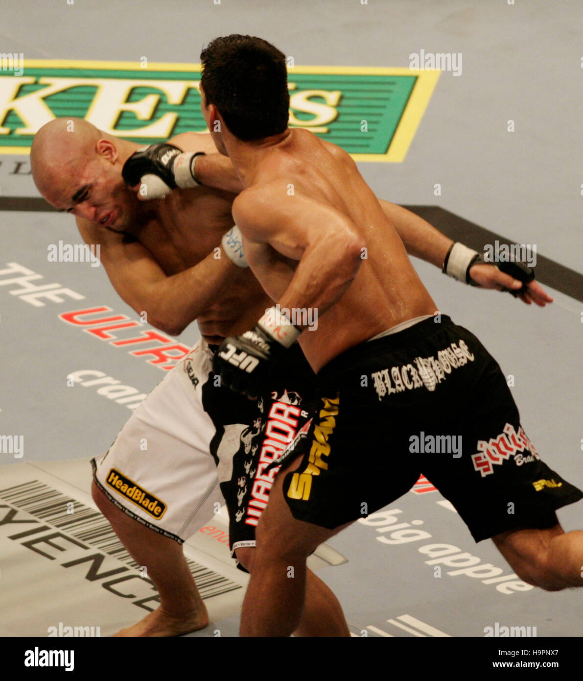 Lyoto Machida, right, fights Sam Hoger at the Ultimate Fighting ...