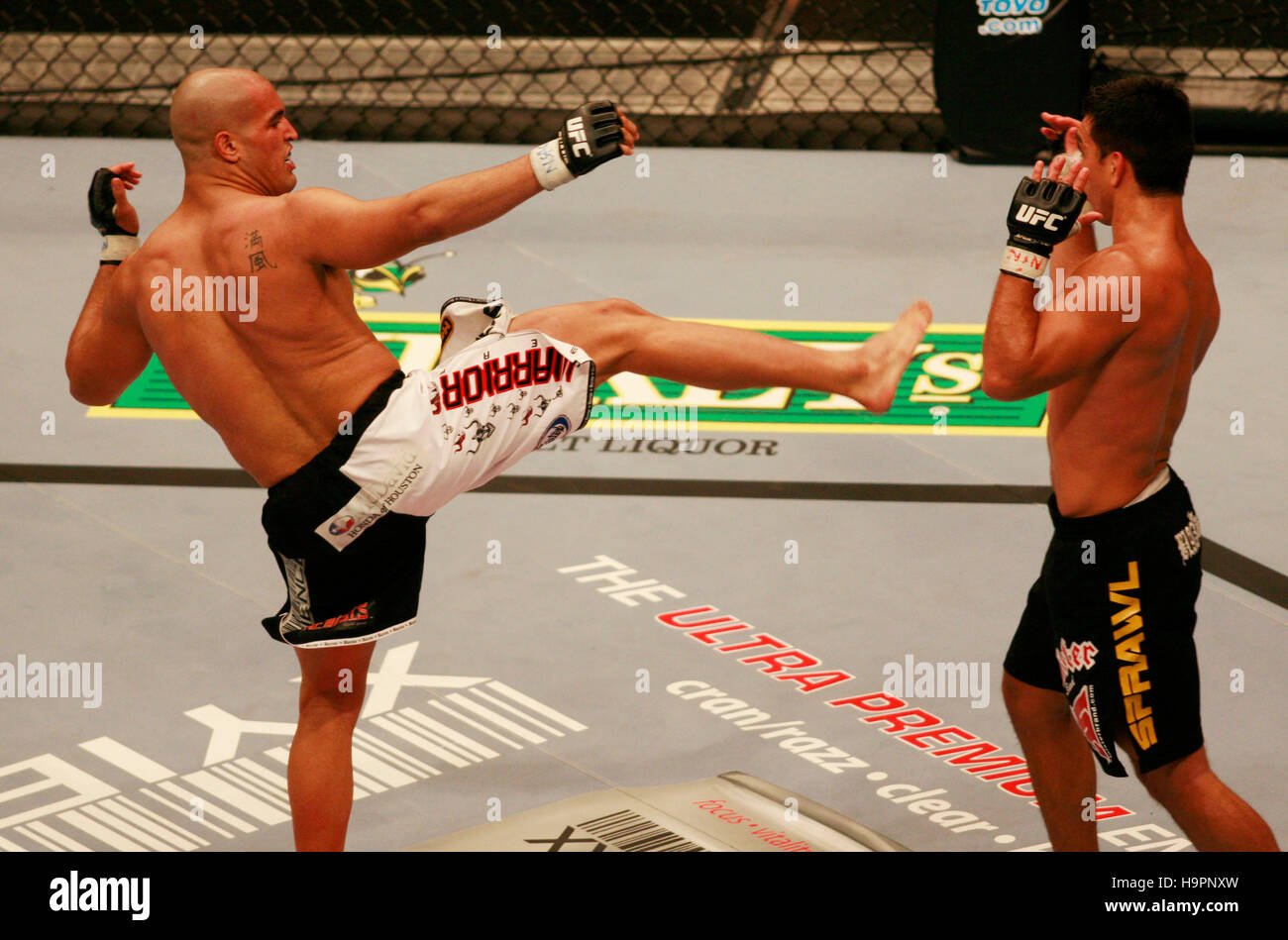 Lyoto Machida, right, fights Sam Hoger at the Ultimate Fighting ...
