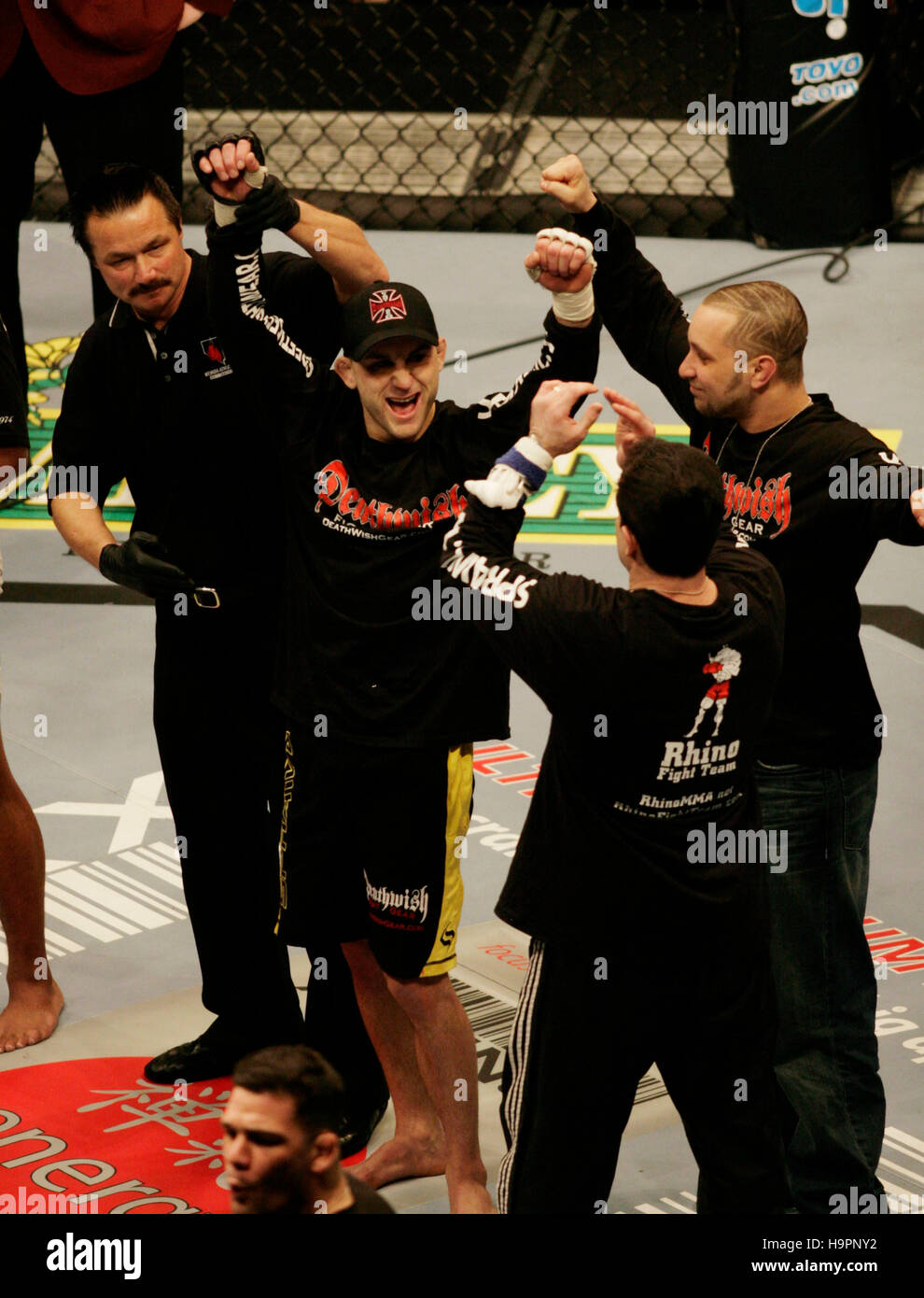 Frank Edgar celebrates his victory over Tyson Griffin at the Ultimate ...