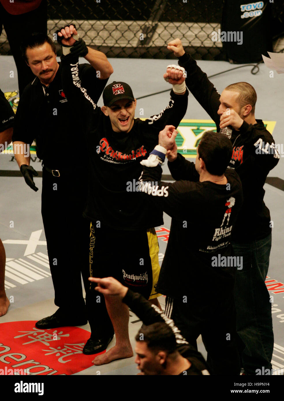 Frank Edgar celebrates his victory over Tyson Griffin at the Ultimate ...