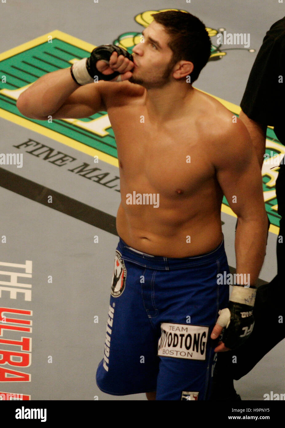 Patrick Cote celebrates his victory over Scott Smith at the Ultimate ...