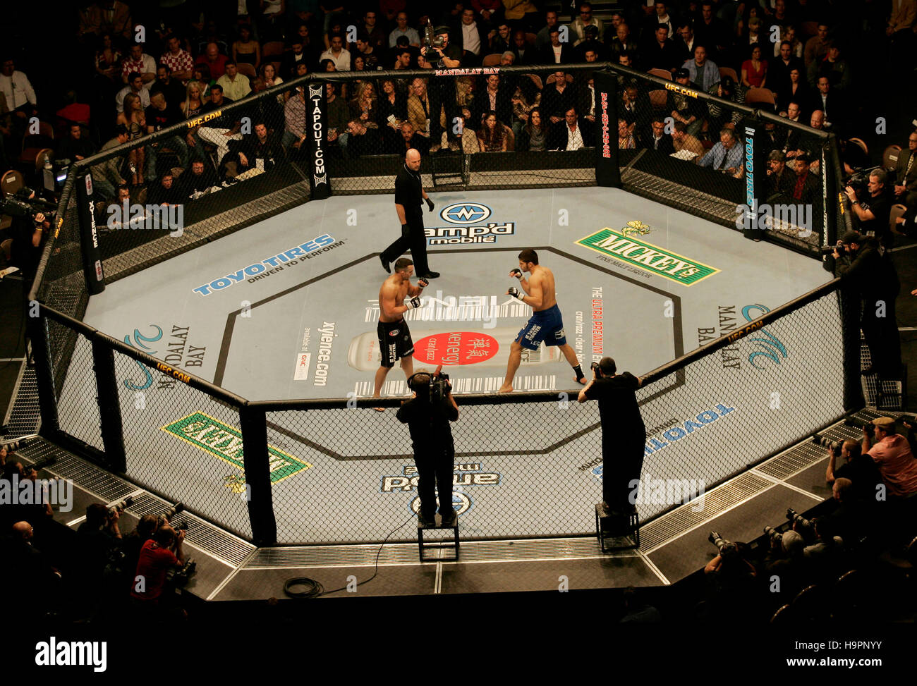 Patrick Cote, right, fights Scott Smith at the Ultimate Fighting ...