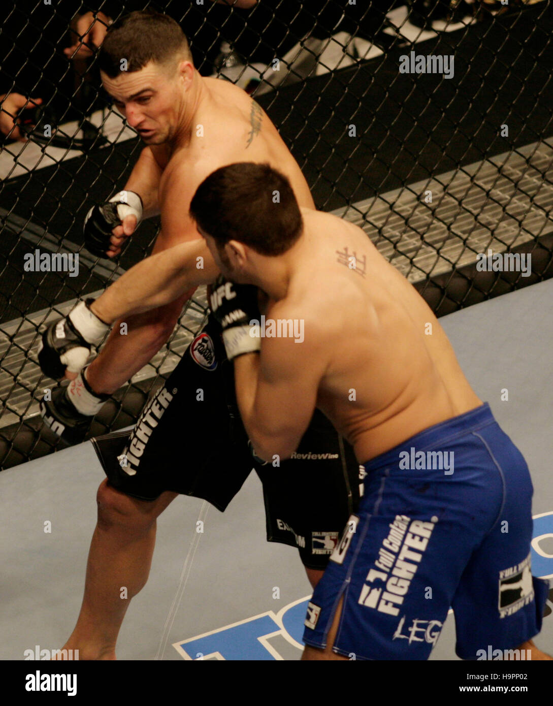 Patrick Cote, right, fights Scott Smith at the Ultimate Fighting ...