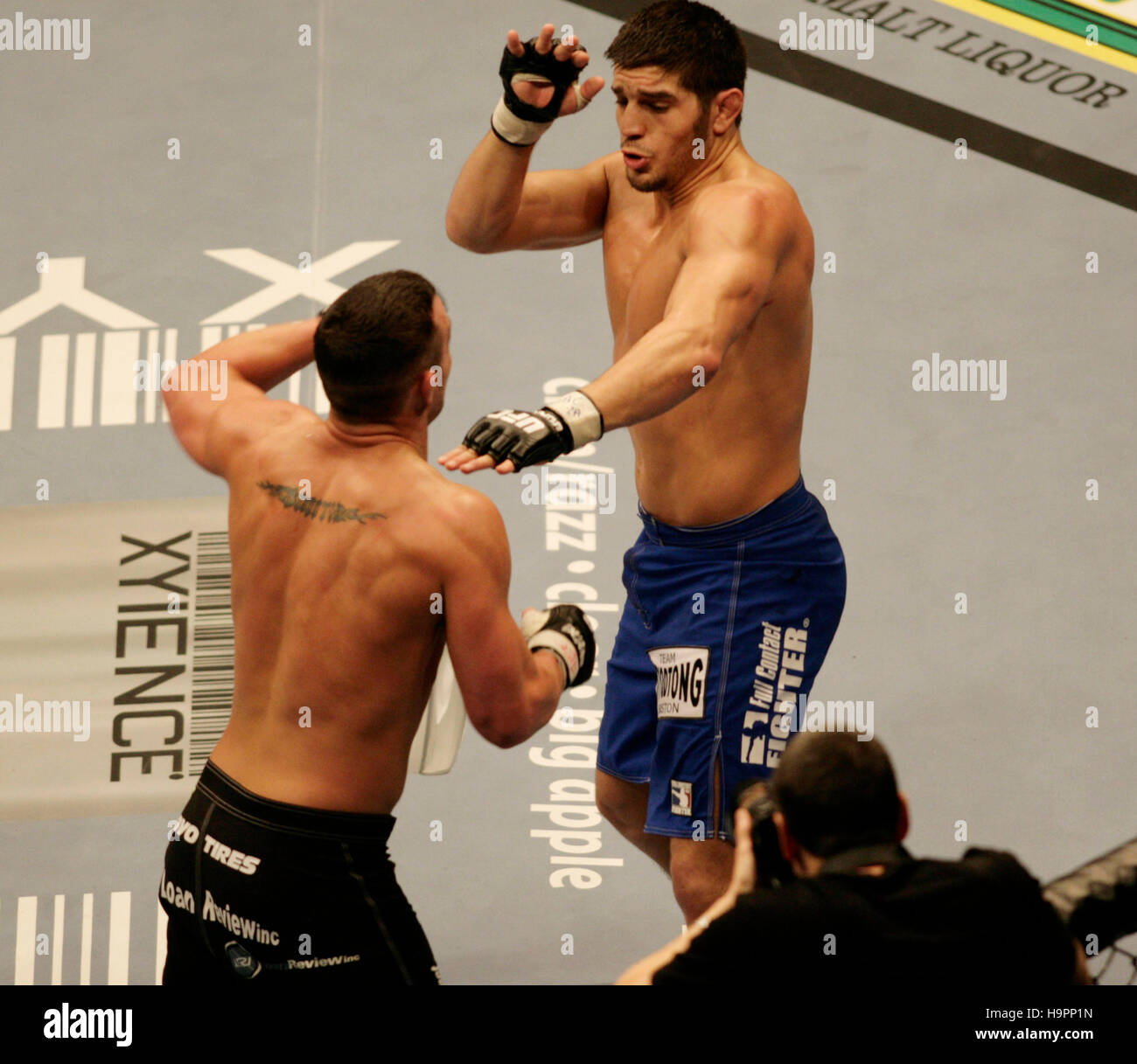 Patrick Cote, right, fights Scott Smith at the Ultimate Fighting ...