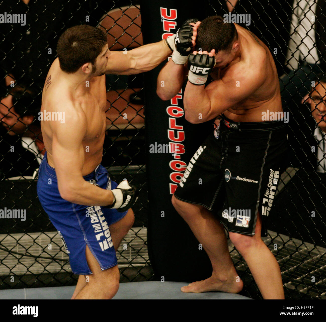 Patrick Cote, left, fights Scott Smith at the Ultimate Fighting ...