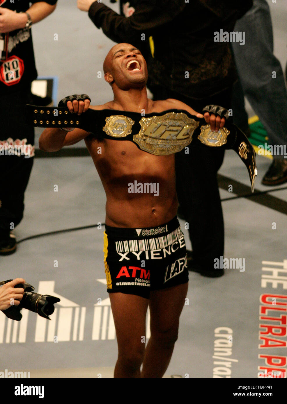 Anderson Silva celebrates his victory over Travis Lutter at the ...