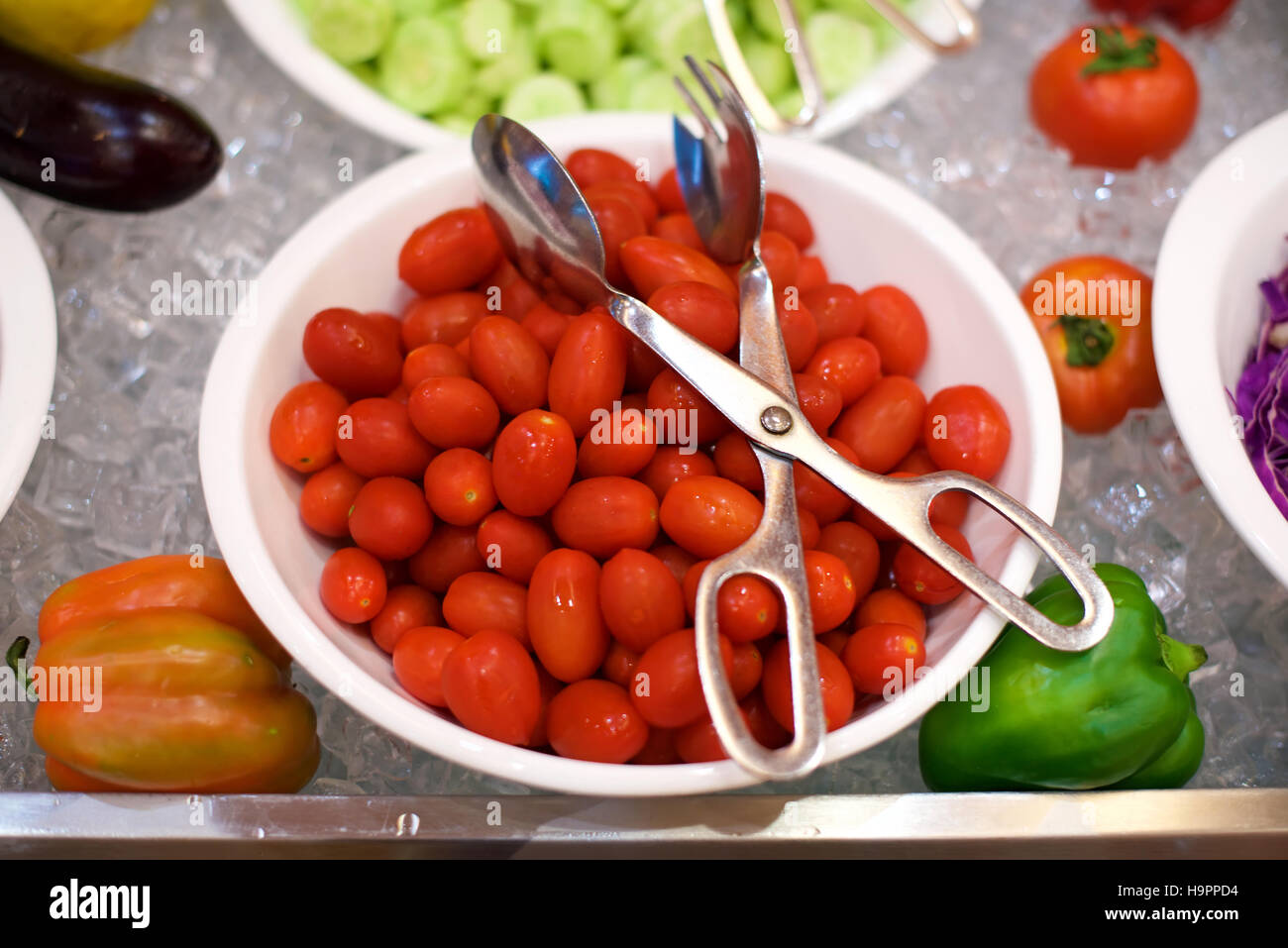 Sweet tomatoes in restaurant buffet Stock Photo - Alamy