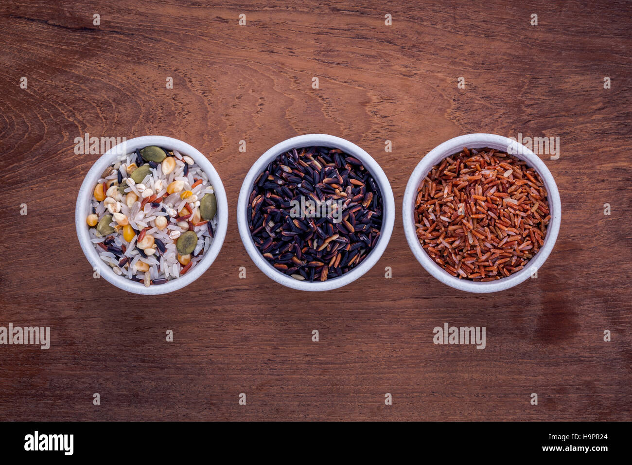 Mixed Whole grain Traditional Thai rice in the spoon and bowl be Stock ...